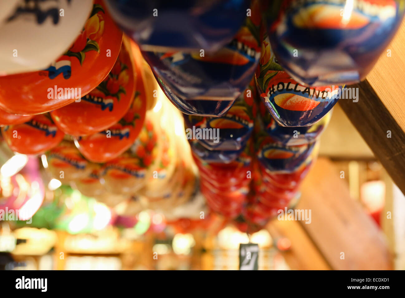 Holland clog wooden shoes hanging Stock Photo - Alamy
