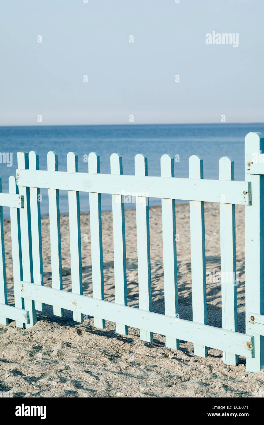 Blue wooden fence barrier beach Italy ocean Stock Photo - Alamy