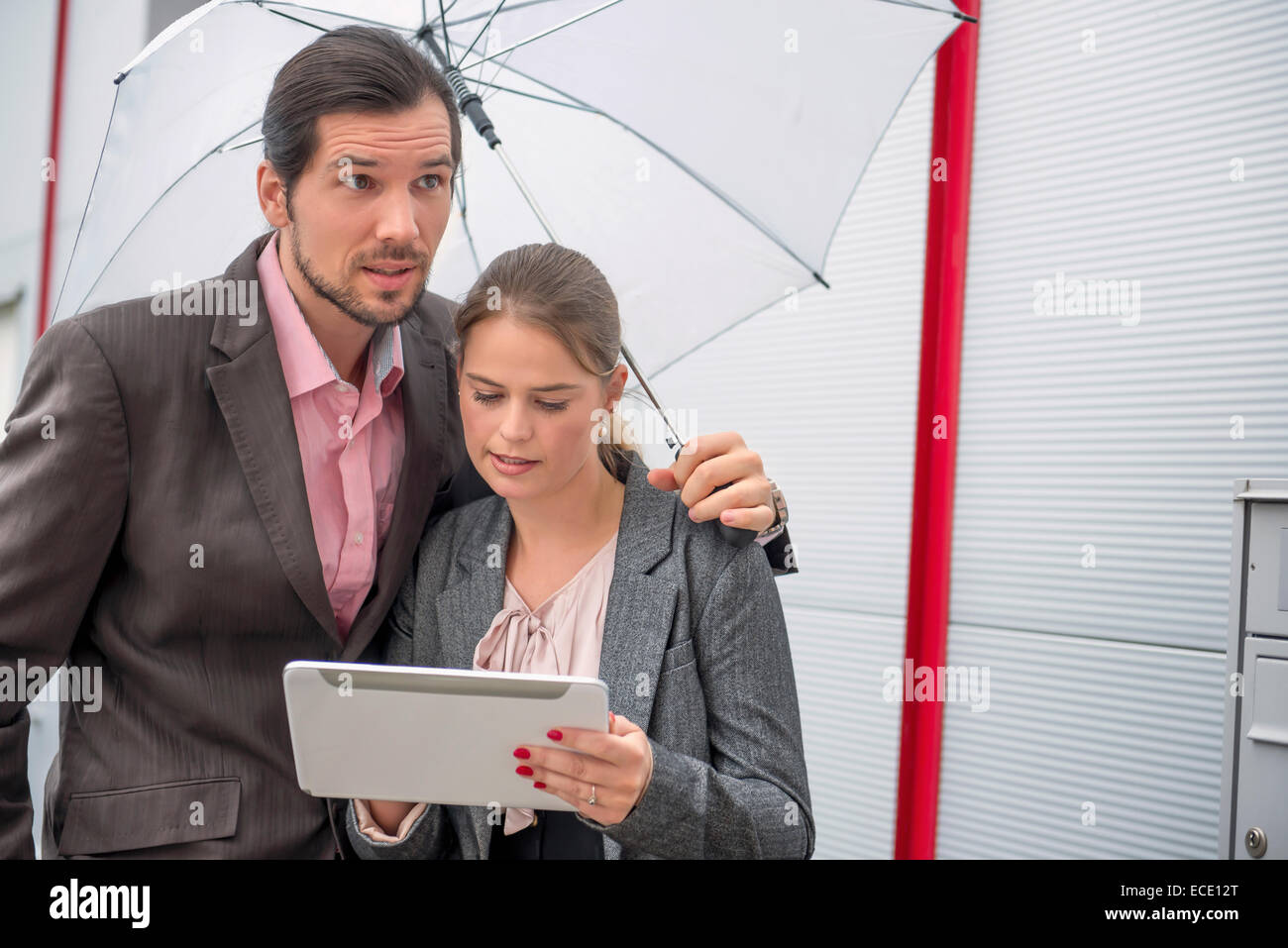 Young couple Teamwork Tablet Computer Cooperation Stock Photo - Alamy