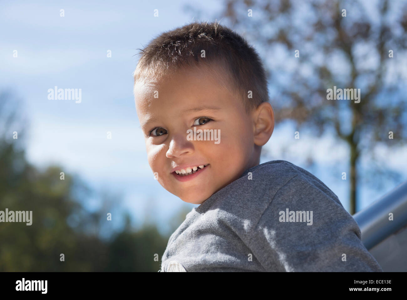 Smiling small young boy portrait close up Stock Photo - Alamy