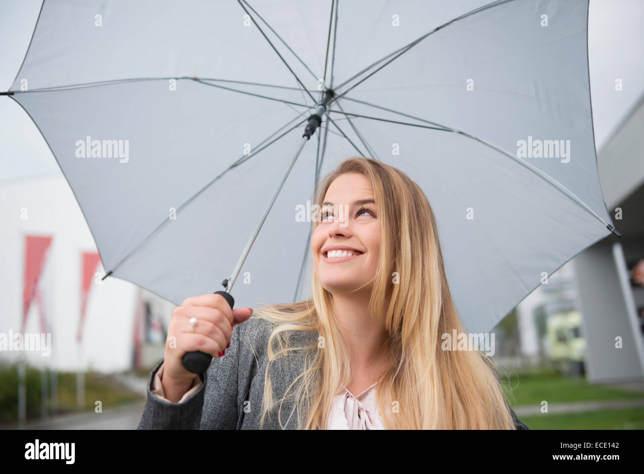 Hope safety security woman rain weather Positive Stock Photo - Alamy