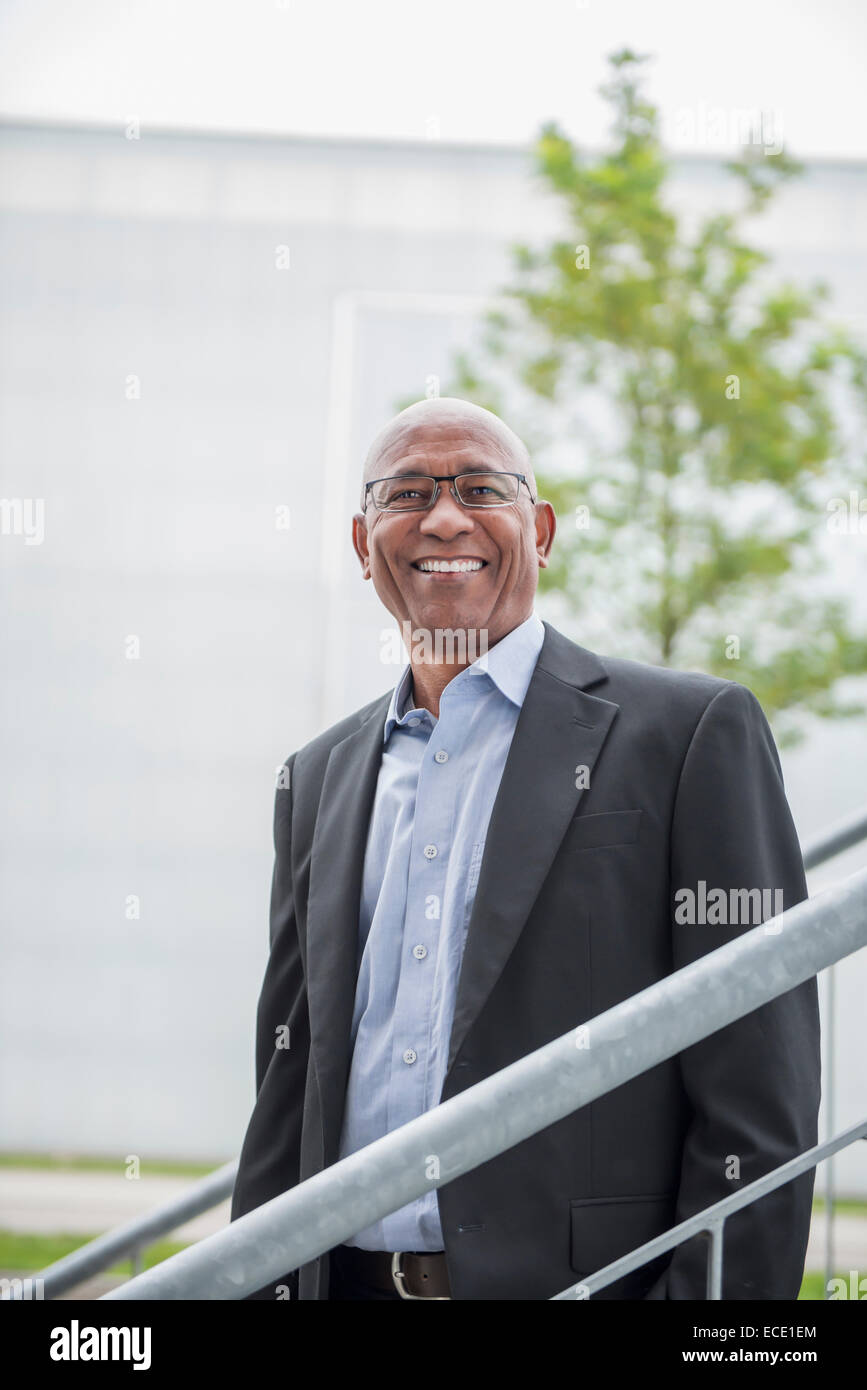 Dependable African portrait businessman suit Stock Photo - Alamy