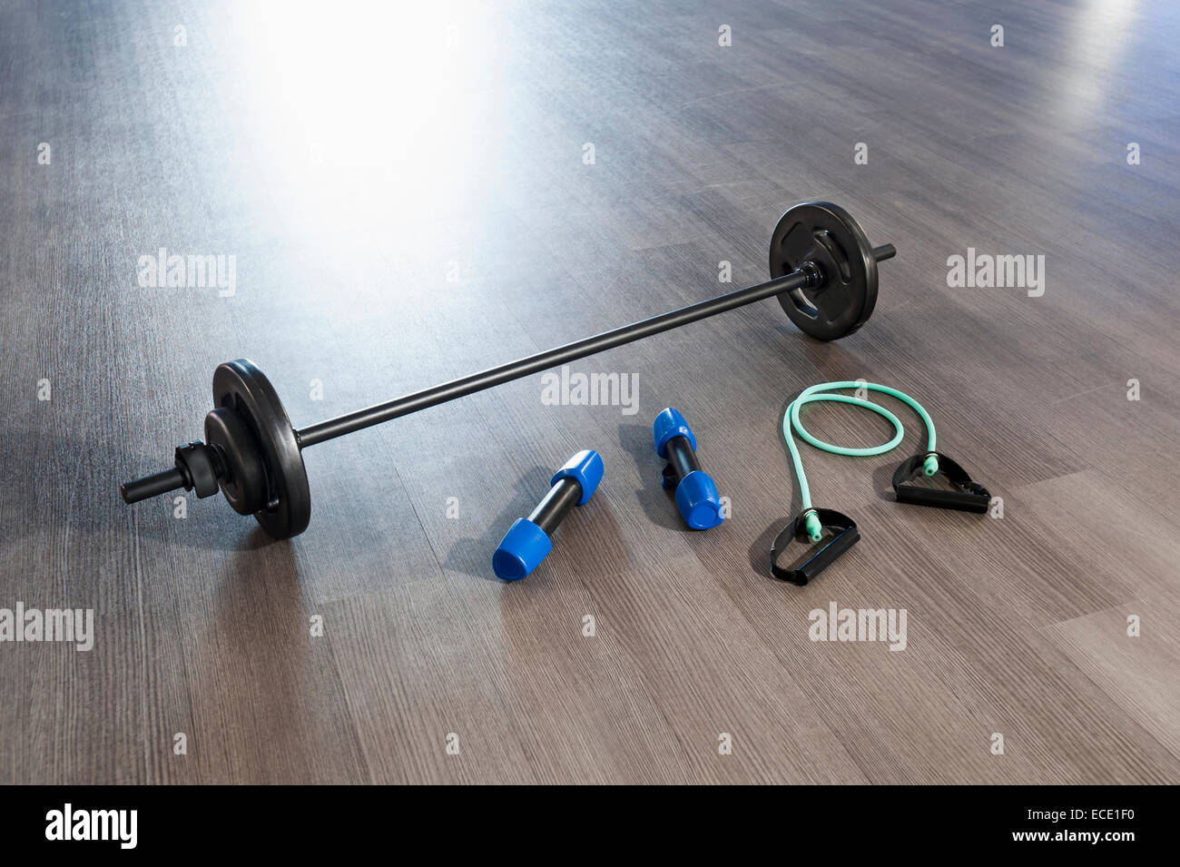 Fitness training room wooden floor barbell Stock Photo - Alamy