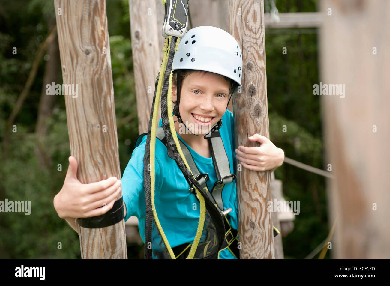 Boys climbing tree boy boy climb tree hi-res stock photography and ...
