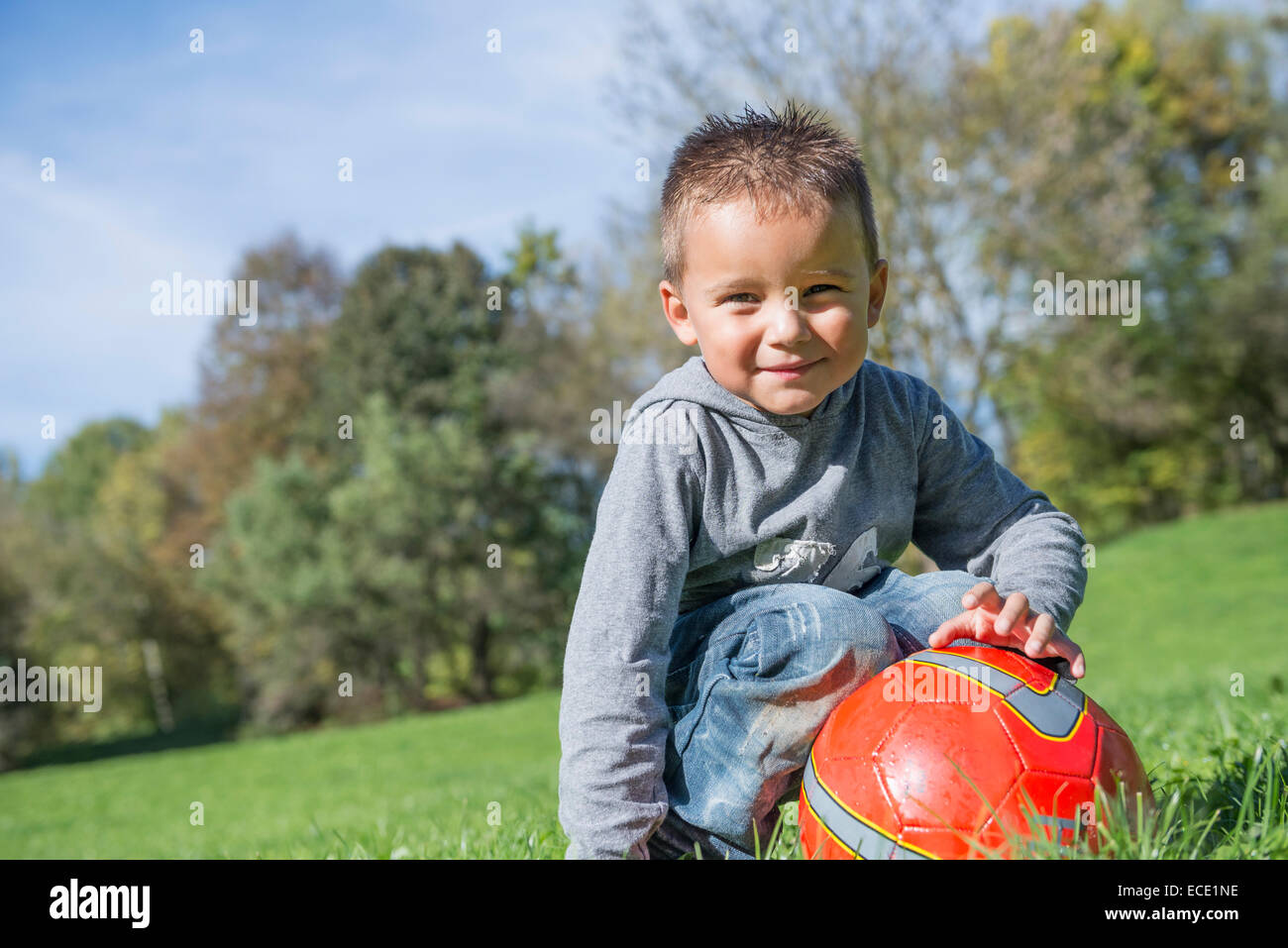Boy in red jumper hi-res stock photography and images - Alamy