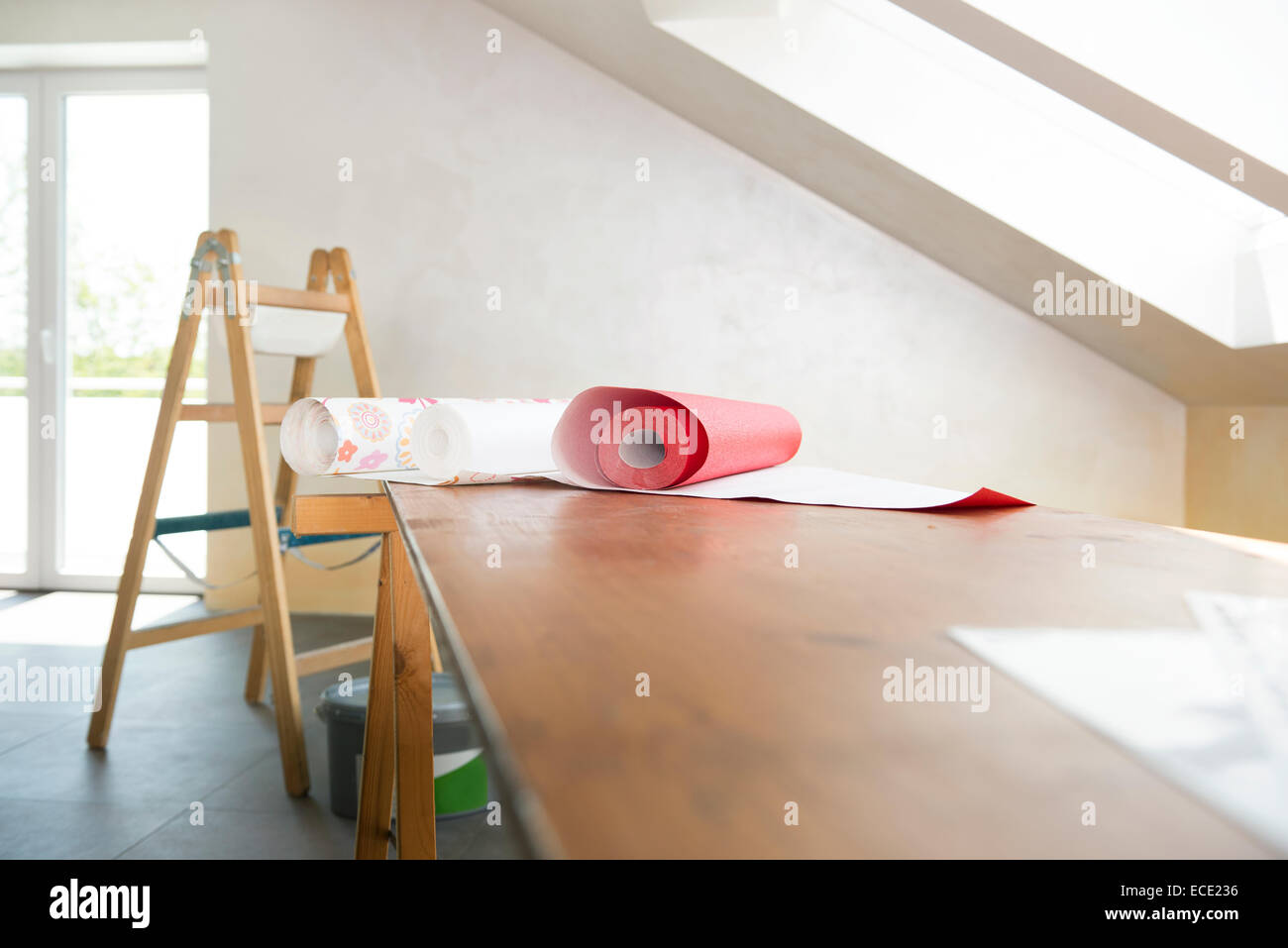 Still life table wallpaper ladder empty room Stock Photo - Alamy
