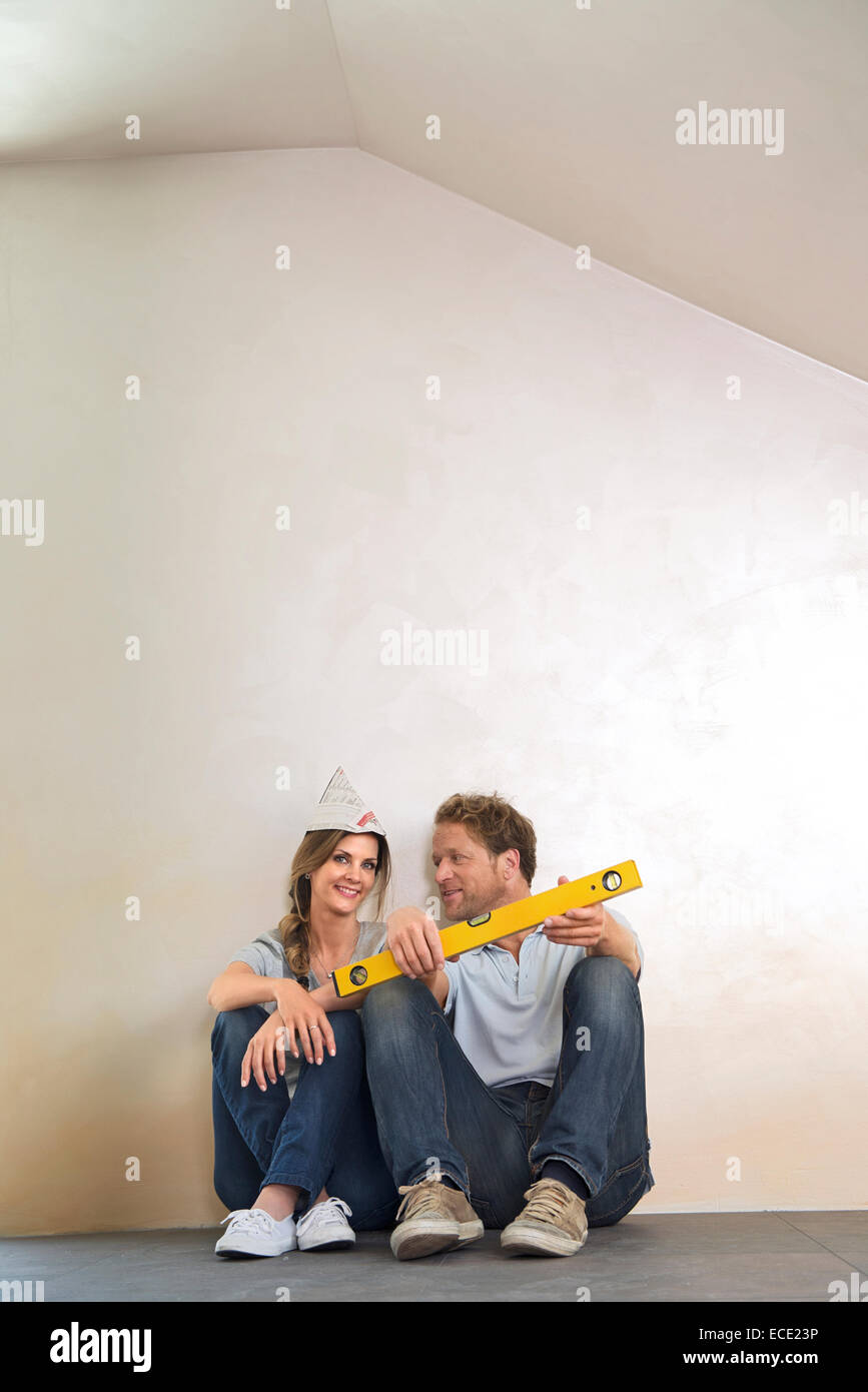 Taking a break couple new home planning Stock Photo - Alamy