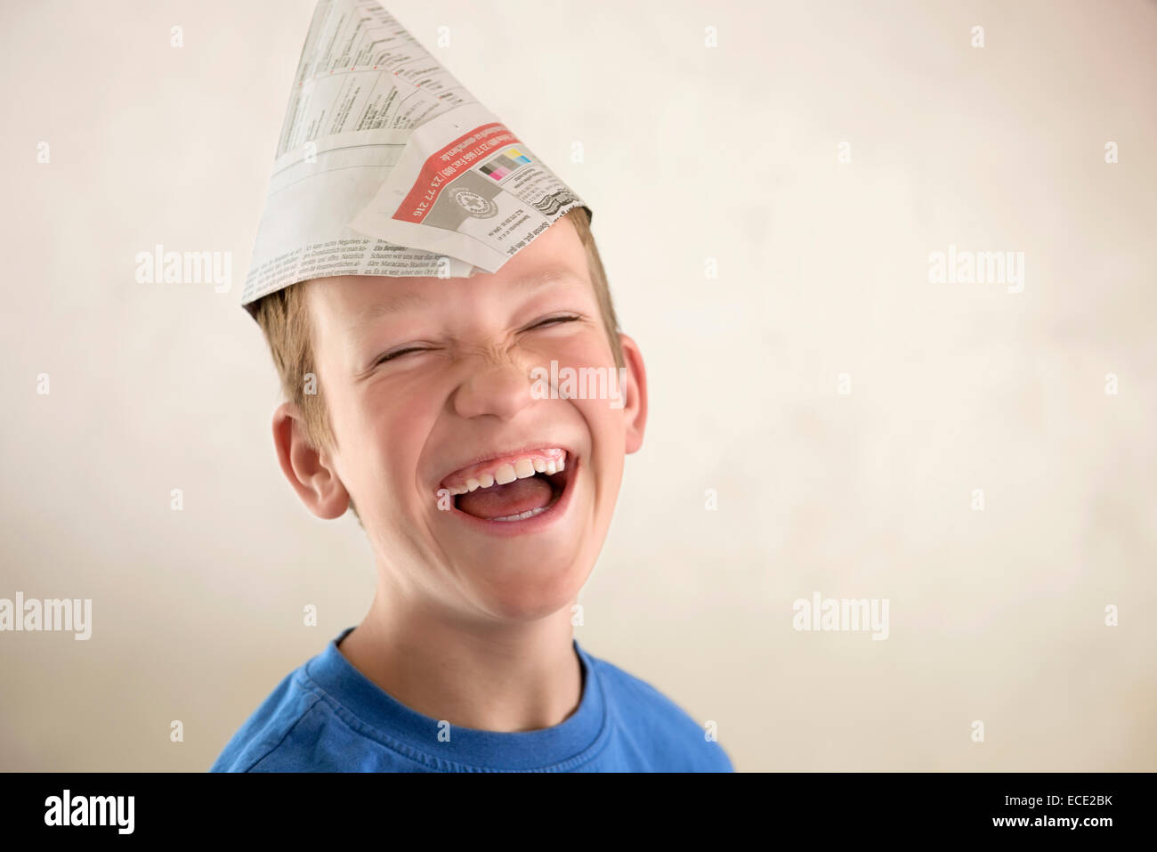 Portrait boy paper hat painting decorating Stock Photo - Alamy