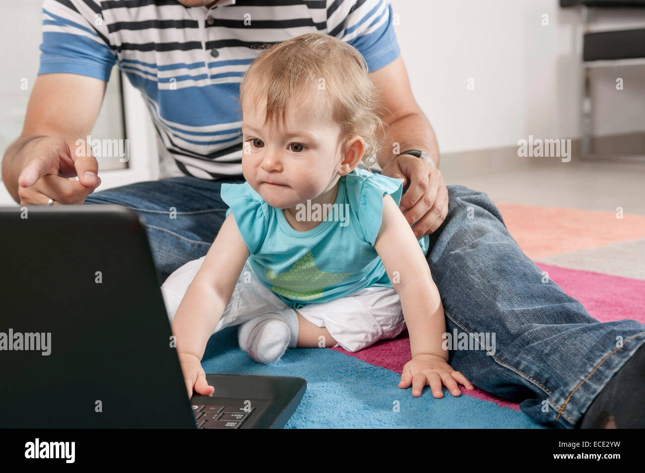 Baby concentrating hi-res stock photography and images - Alamy