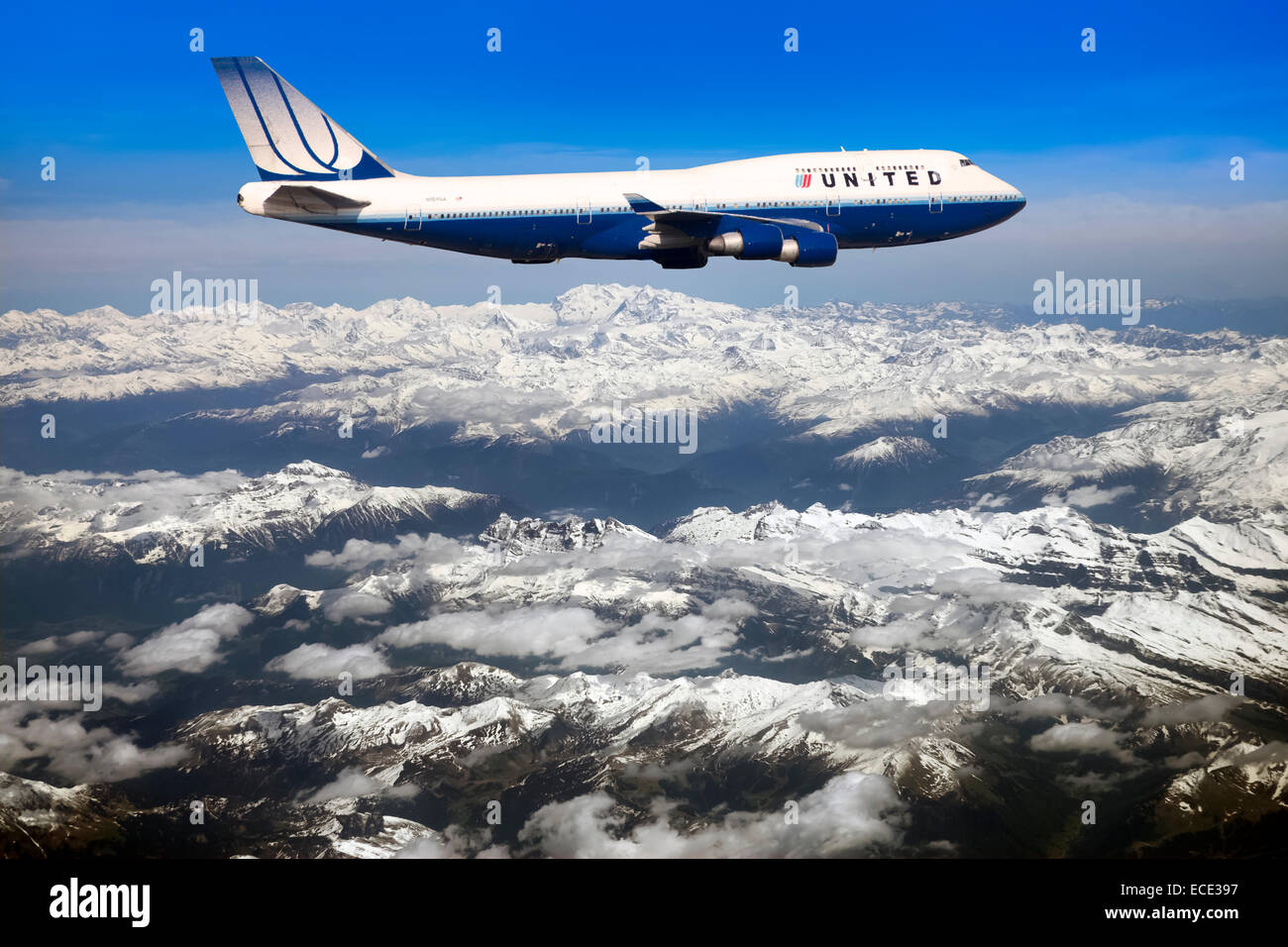 United Airlines Boeing 747-422 N104UA in flight over the Alps Stock ...
