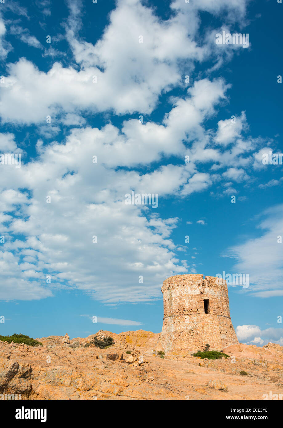 Genoese tower with clouds, Gulf of Porto, Corsica, France Stock Photo ...