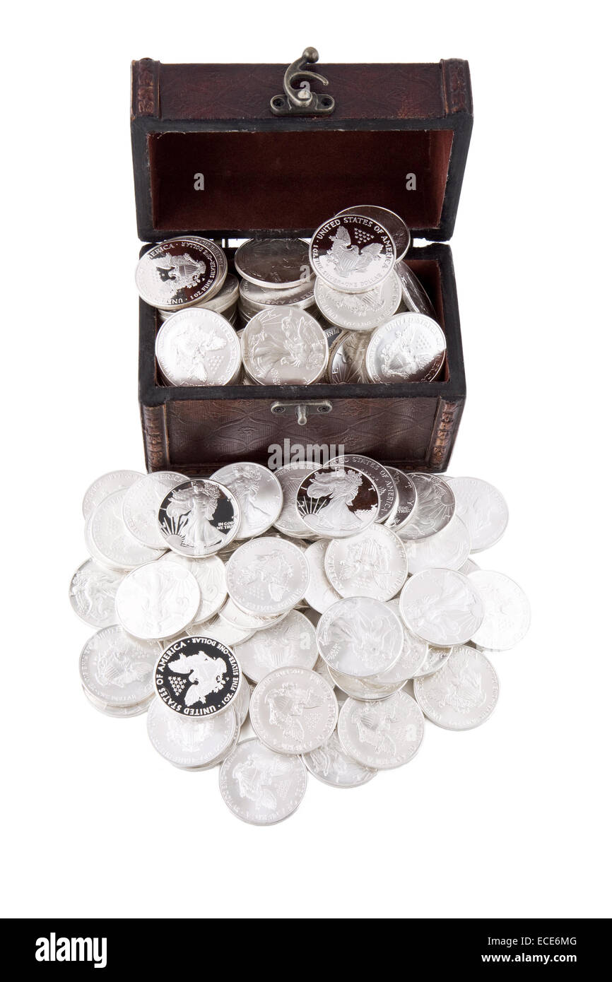 Old case with silver coins, isolated on white background Stock Photo ...