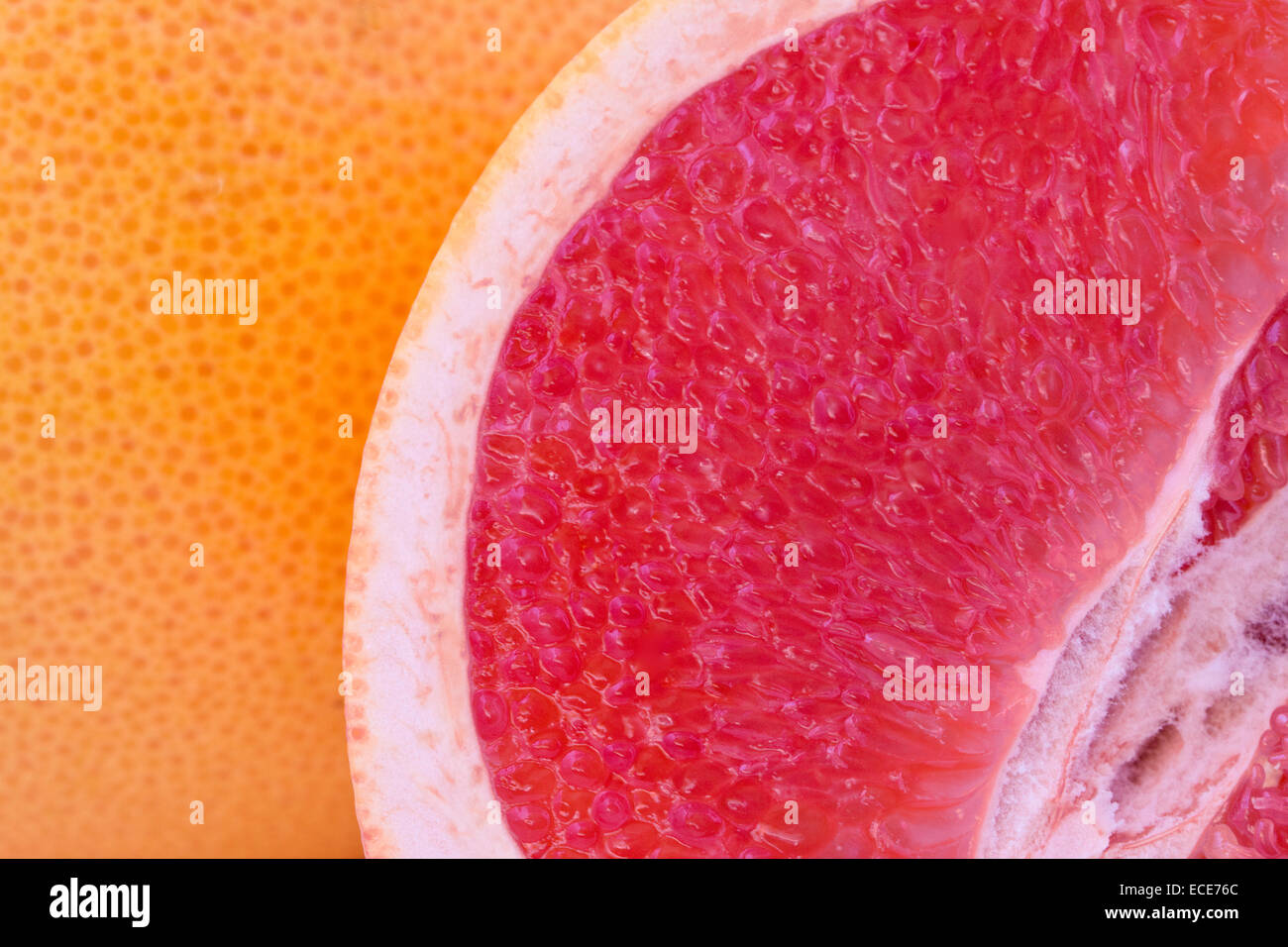 Fresh red grapefruit slice closeup, fruit background Stock Photo - Alamy