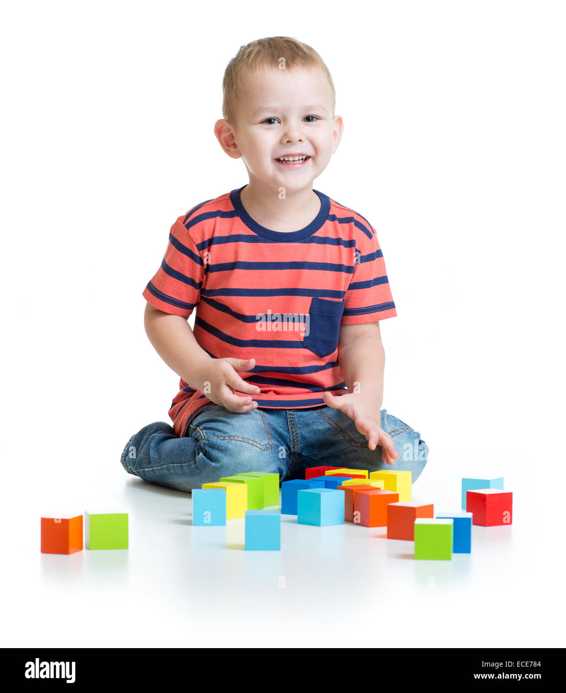 Kid playing and building tower with colorful blocks isolated Stock ...