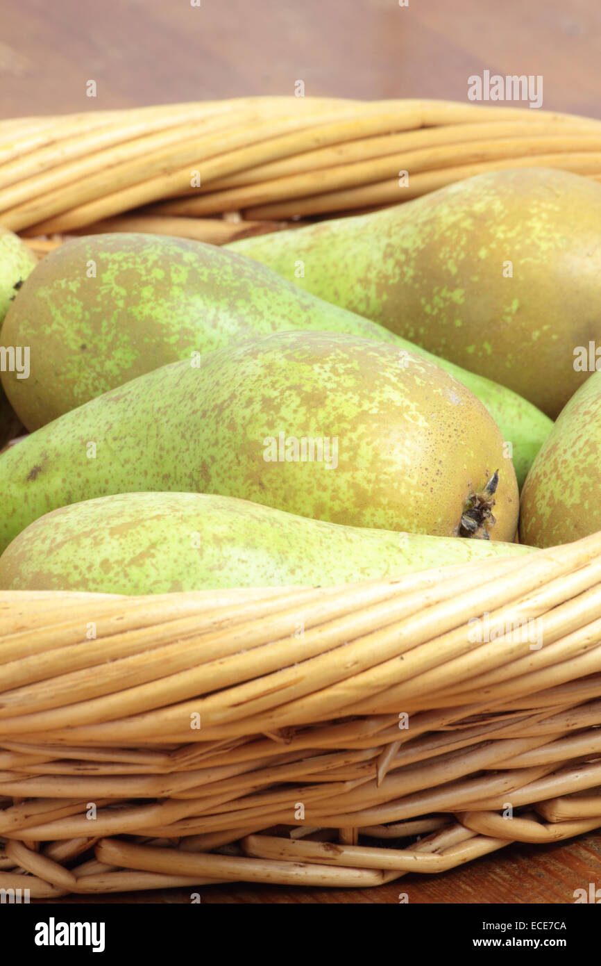 Few pears in a basket Stock Photo - Alamy