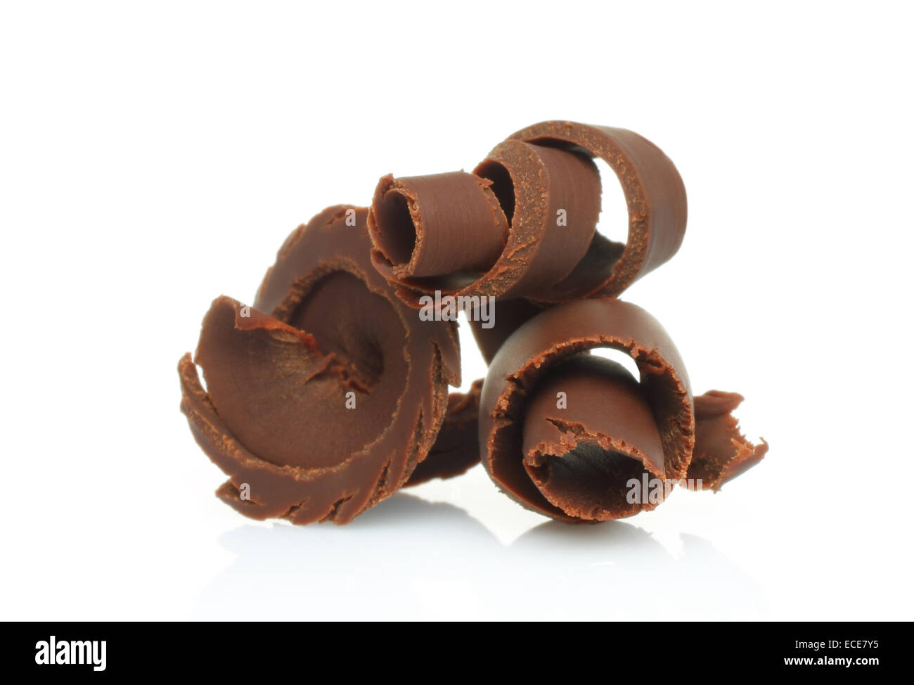 Chocolate shavings on white background Stock Photo - Alamy