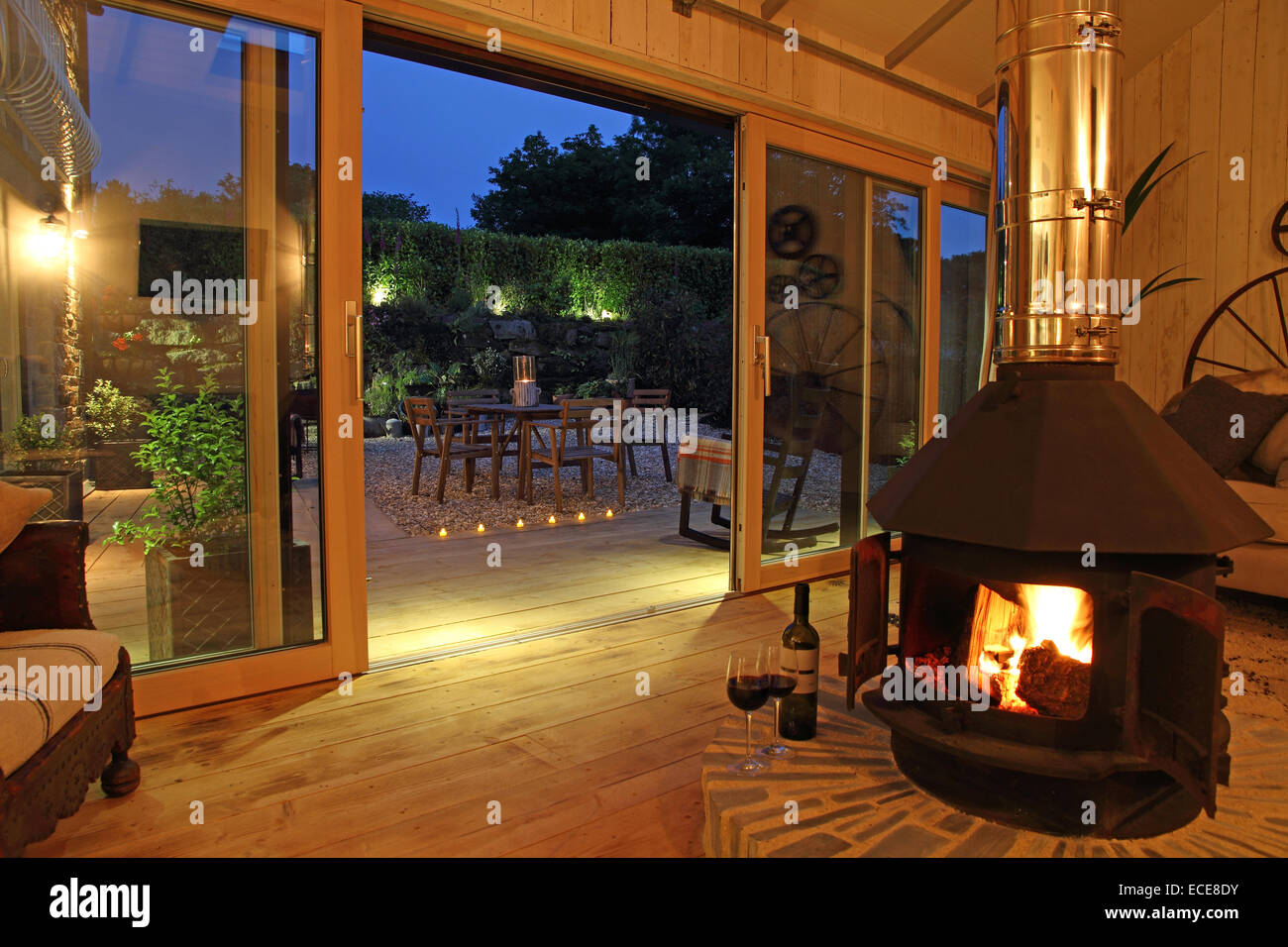 Cosy living/sitting room with fire Stock Photo - Alamy