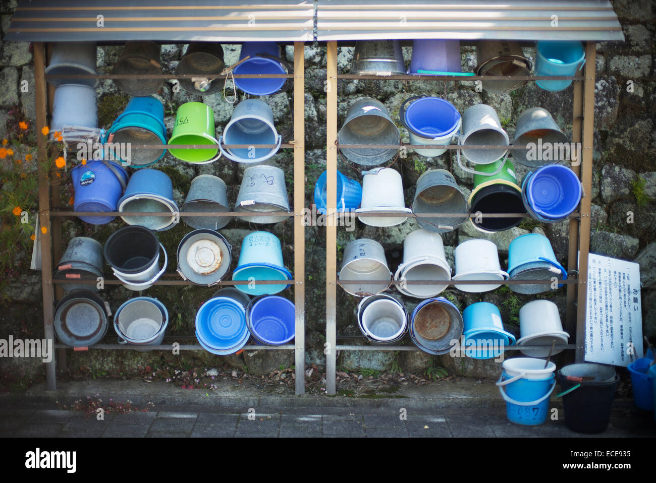 A bucket stand at the gates of a cemetery in Kyoto, Japan Stock Photo ...