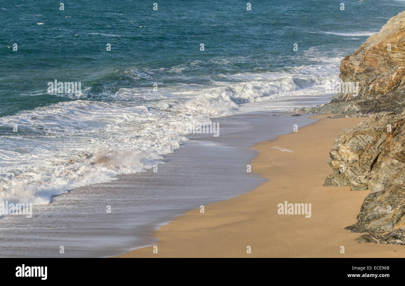 Waves breaking on a sandy beach at Loe bar near Porthleven, Cornwall ...