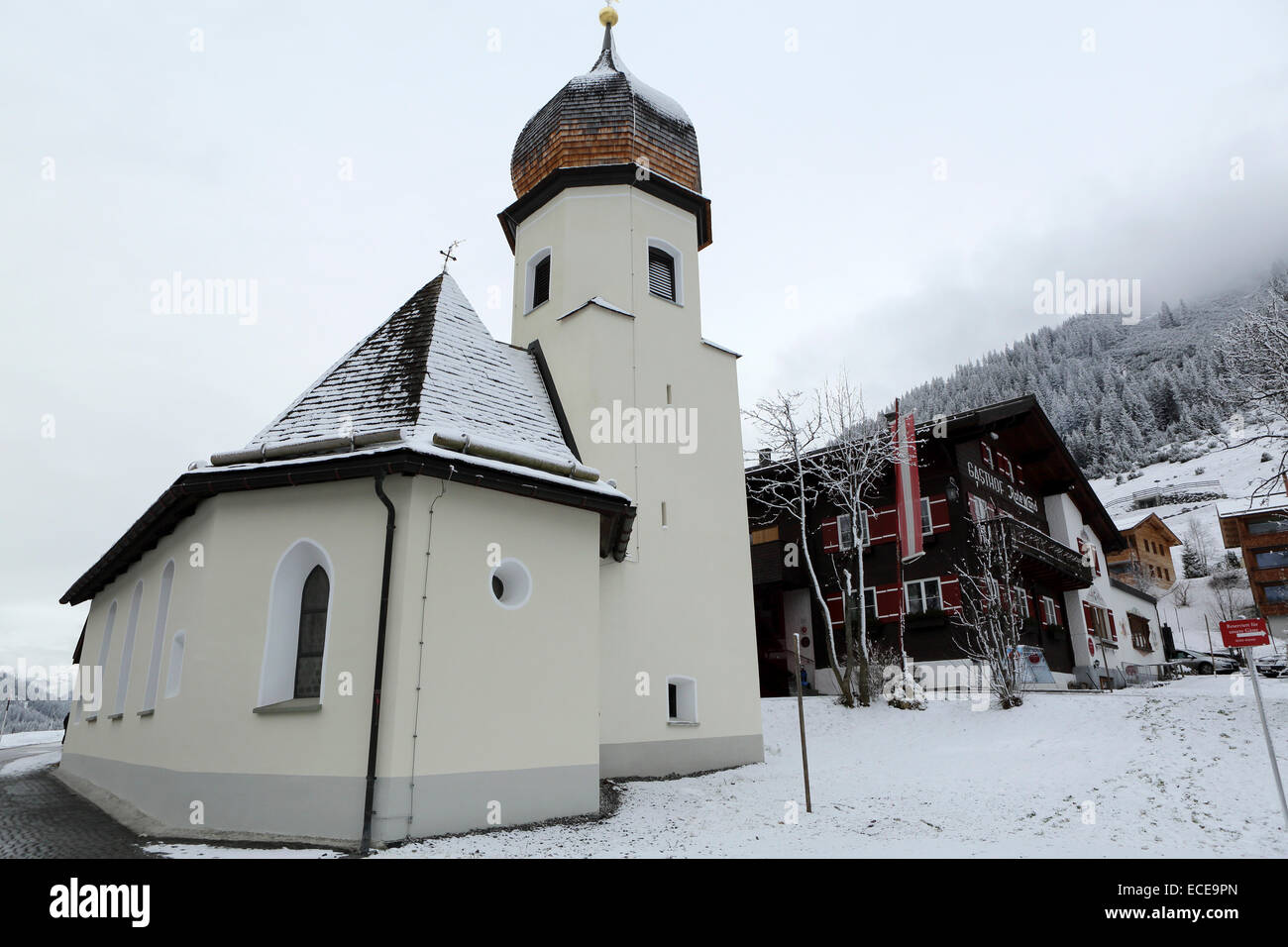 The village church and chalets in Zug, Austria. Zug is in the Arlberg ...
