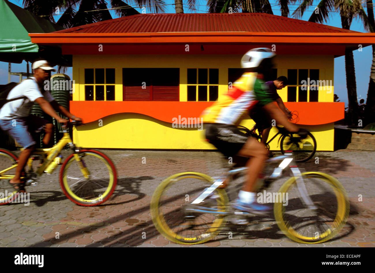 Cyclists. Bar by the sea. Roxas Boulevard. Manila. Philipphines. Roxas ...