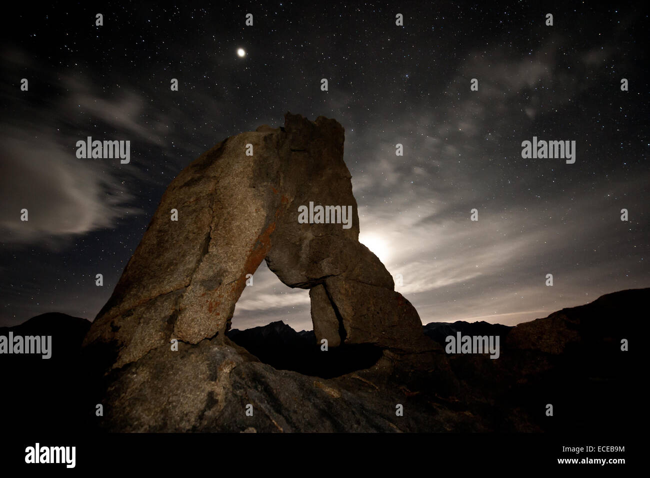 Night sky over natural arch rock formation Stock Photo - Alamy