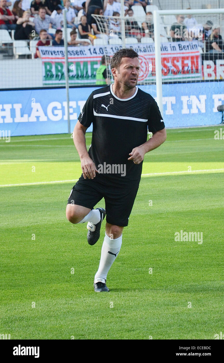 Retired football stars from Germany and Portugal playing a charity ...