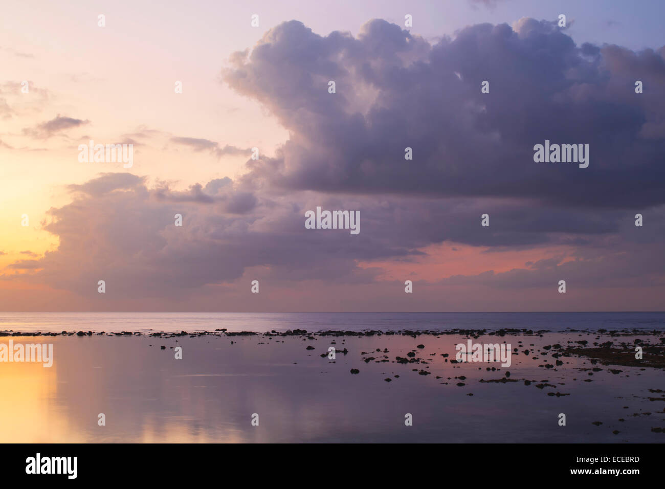 Sunset over ocean, Indonesia Stock Photo - Alamy