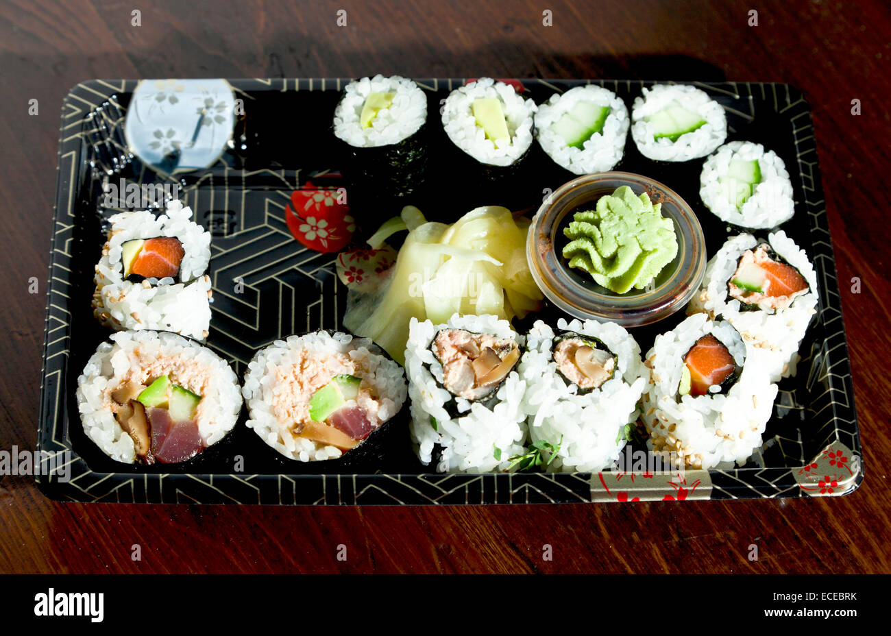 sushi on the black plate Stock Photo - Alamy