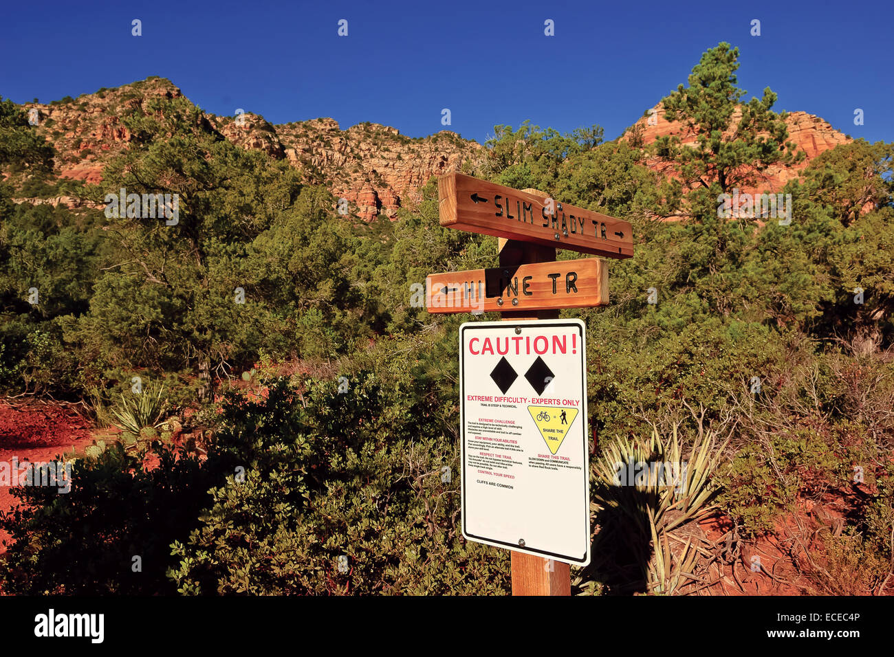 USA, Arizona, Sedona, Warning sign for hikers and bikers in forest ...