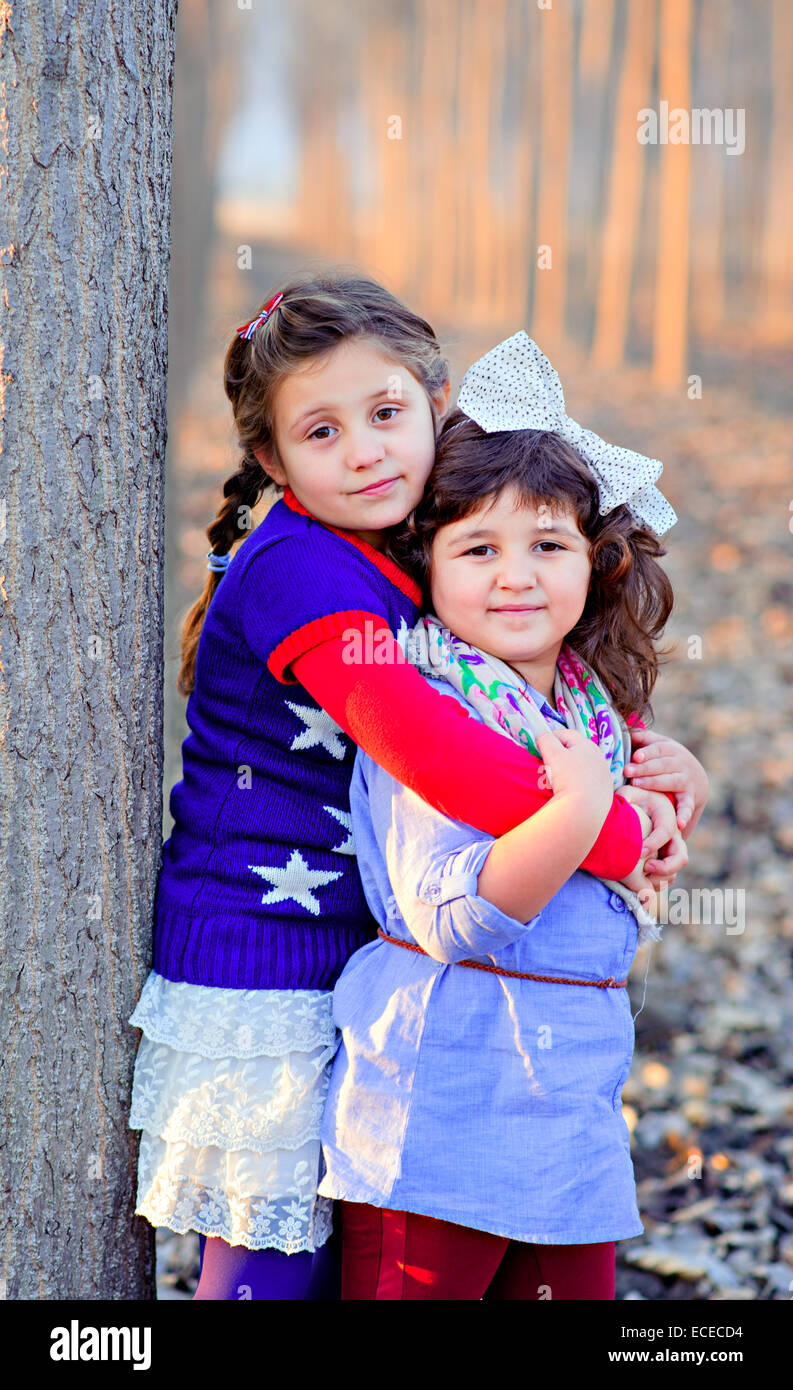Two sisters hugging hi-res stock photography and images - Alamy
