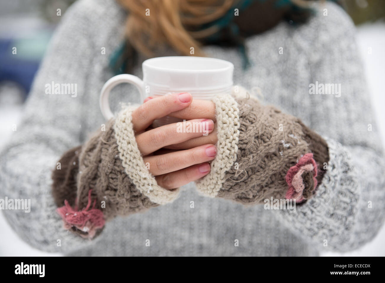 Woman holding hot tea in hi-res stock photography and images - Alamy