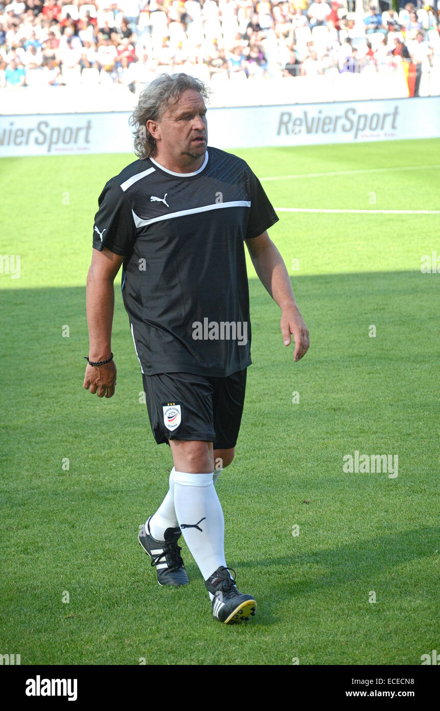 Retired football stars from Germany and Portugal playing a charity ...