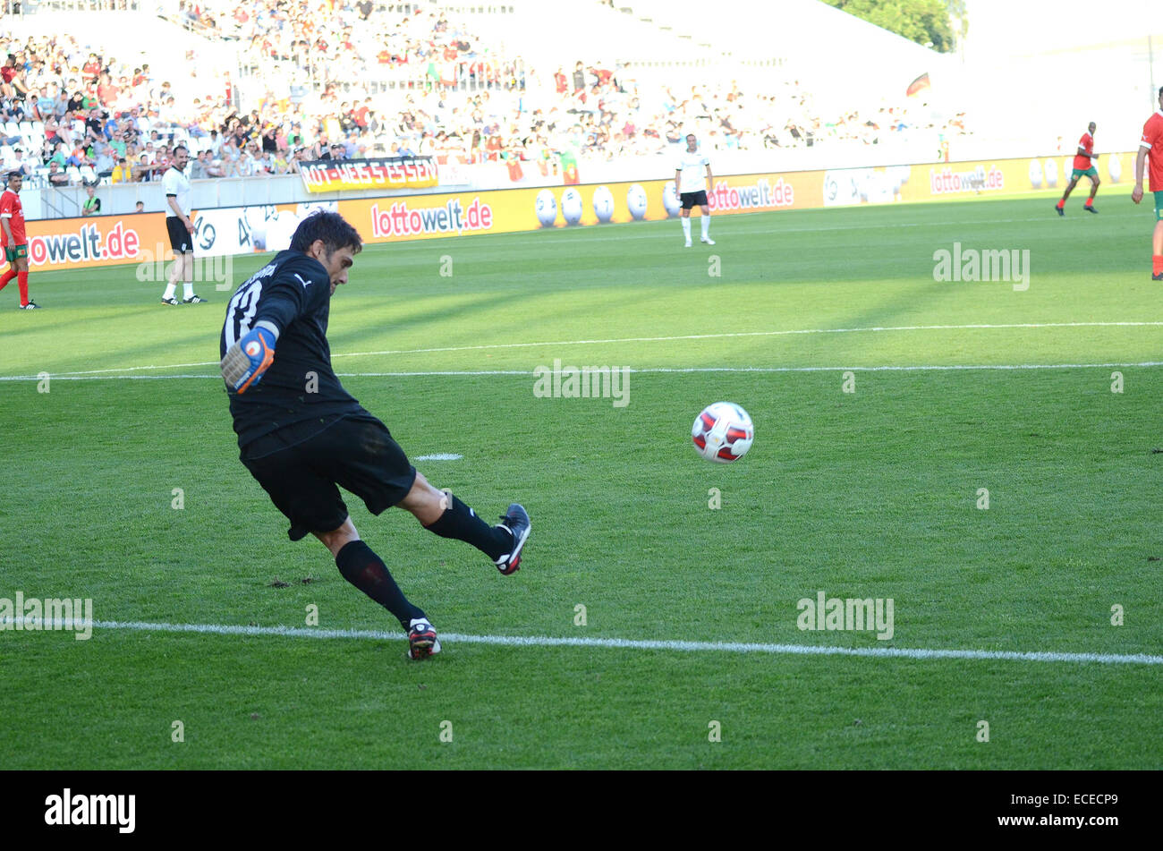 Retired football stars from Germany and Portugal playing a charity ...