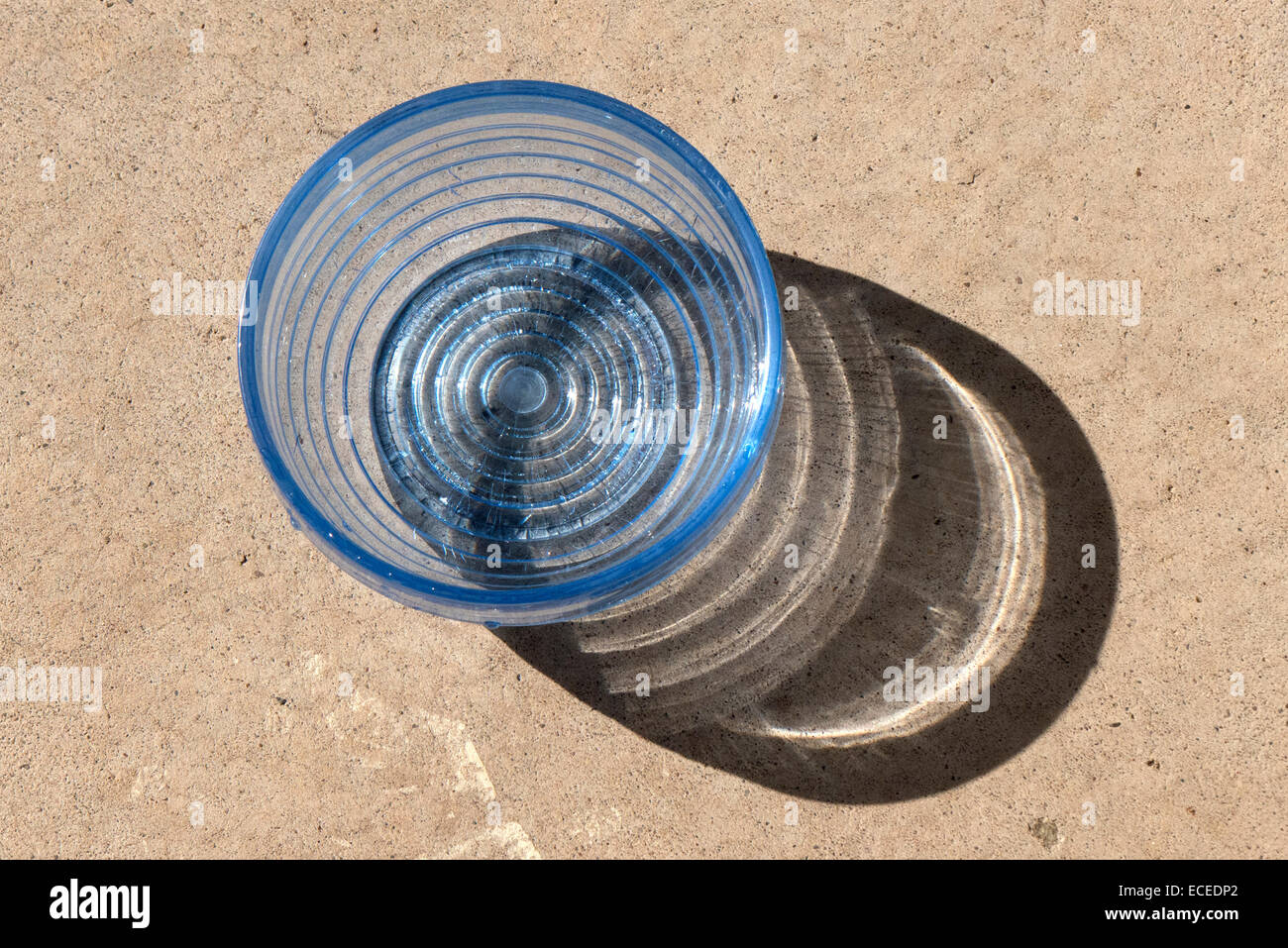 Plastic bowl casting shadow Stock Photo - Alamy