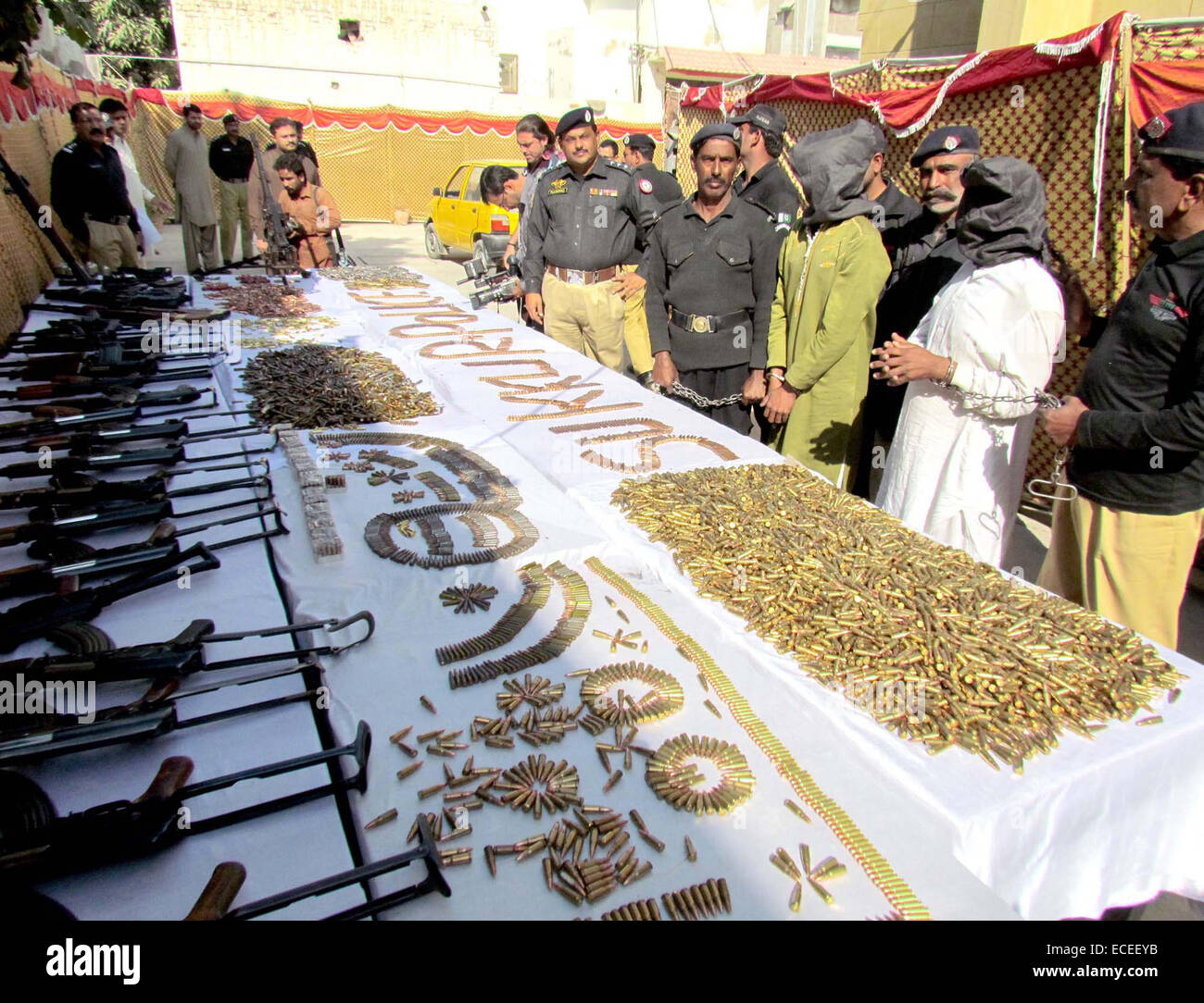 Police staffs showing recovered weapons from smuggler who were trying ...