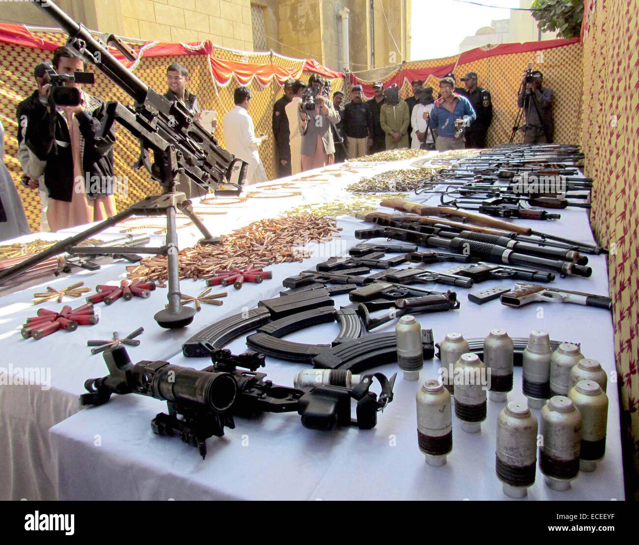 Police staffs showing recovered weapons from smuggler who were trying ...