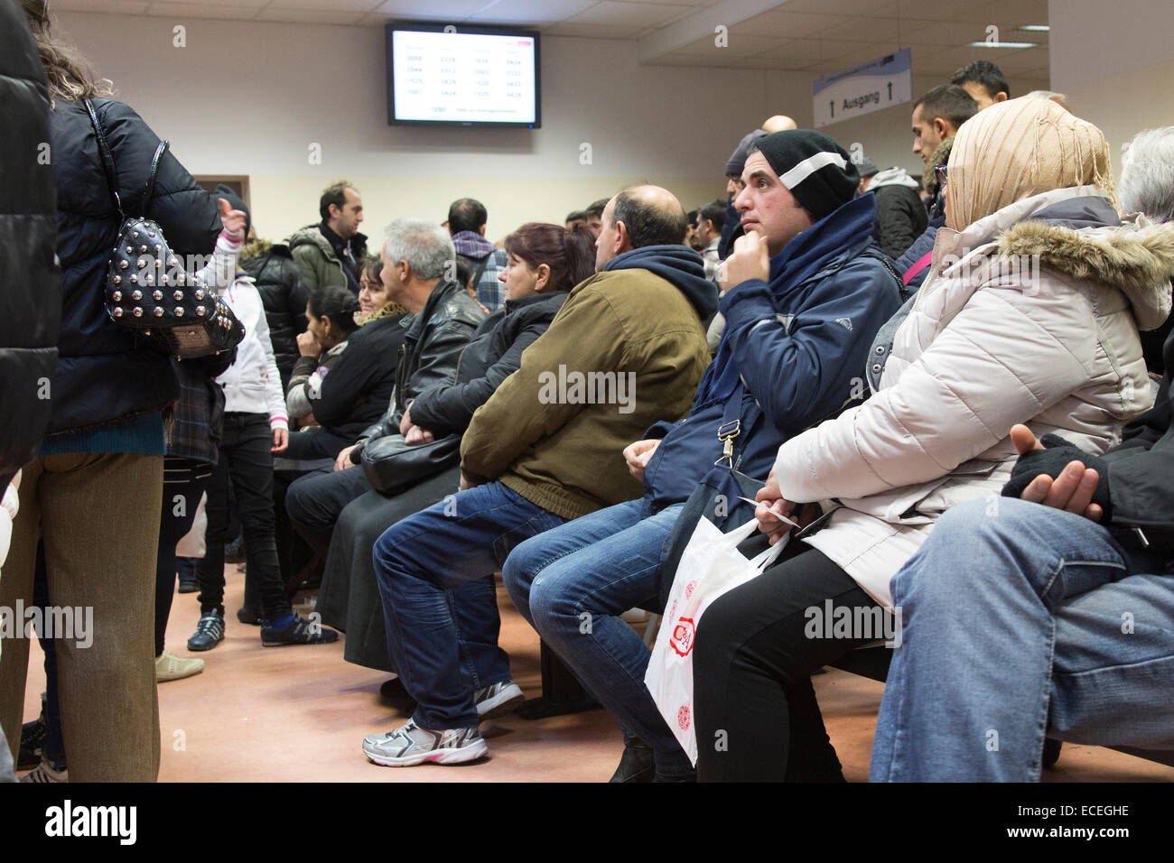 Asylum seekers wait inside the Berlin Central Reception Facility for ...