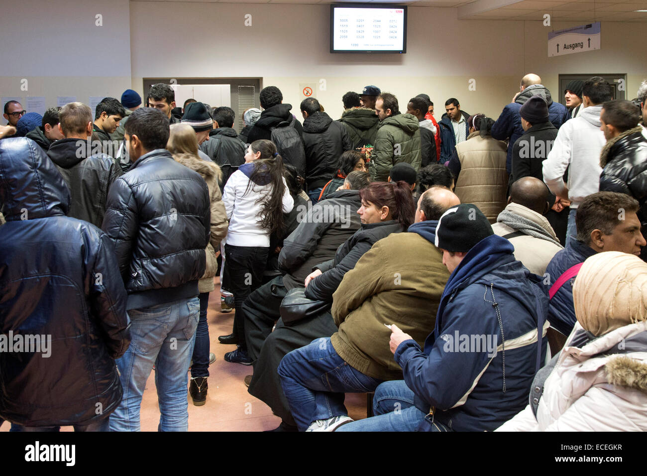 Asylum seekers wait inside the Berlin Central Reception Facility for ...