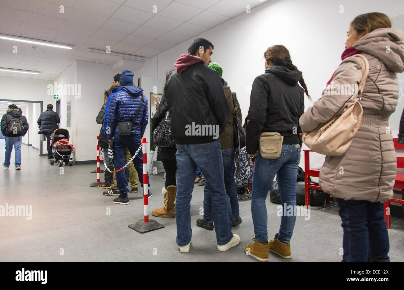 Asylum seekers wait inside the Berlin Central Reception Facility for ...