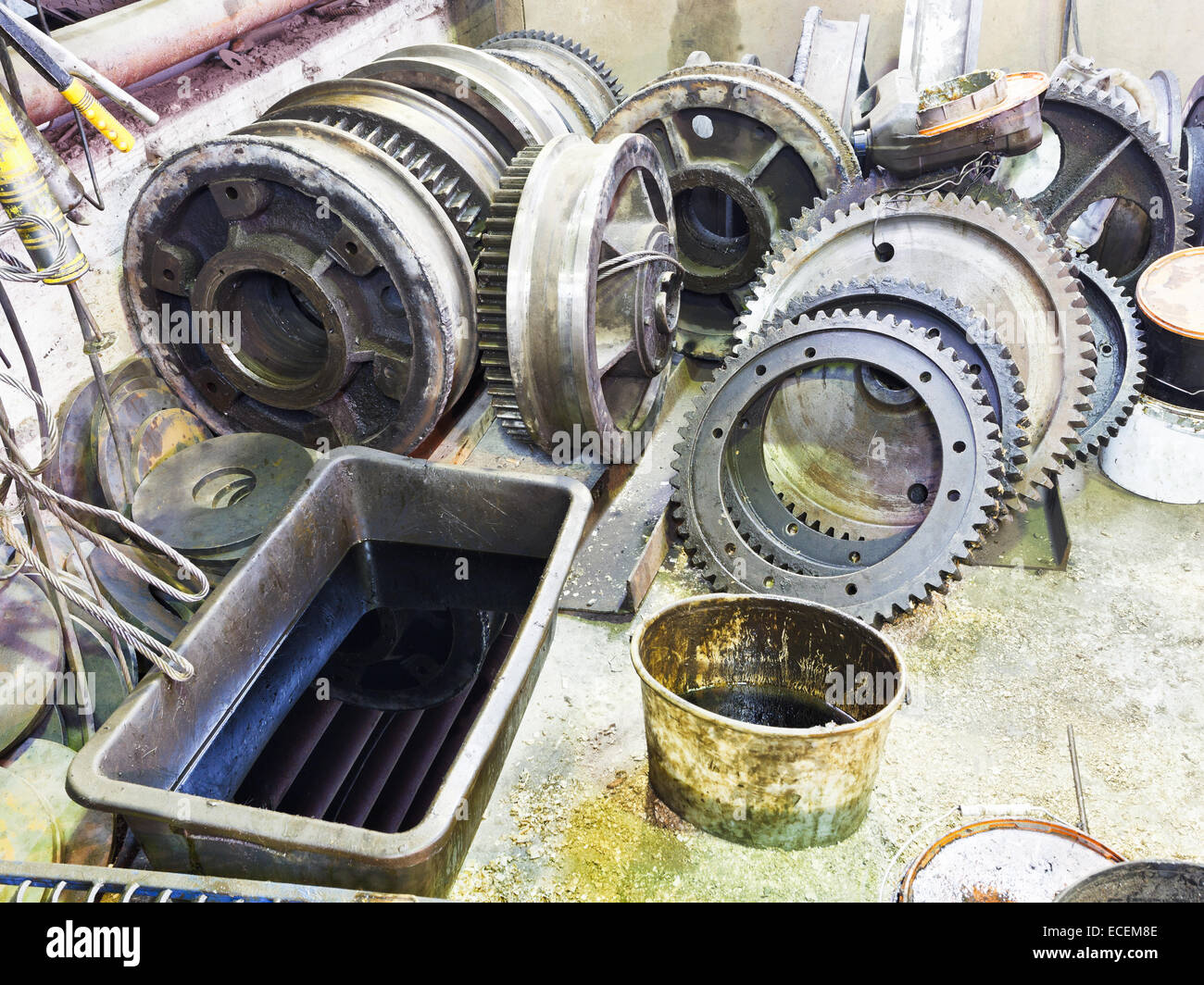 gears of disassembled engine on floor in mechanical workshop Stock ...
