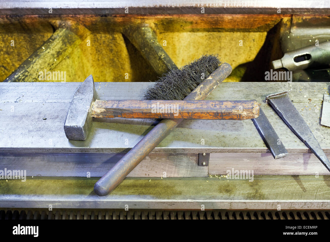 hammer and metal brush on boring machine frame Stock Photo - Alamy