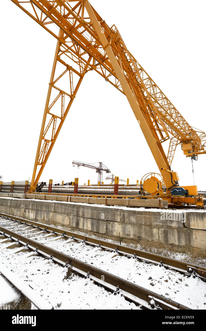 gantry cranes over railroad in metal pipe outdoor warehouse Stock Photo ...