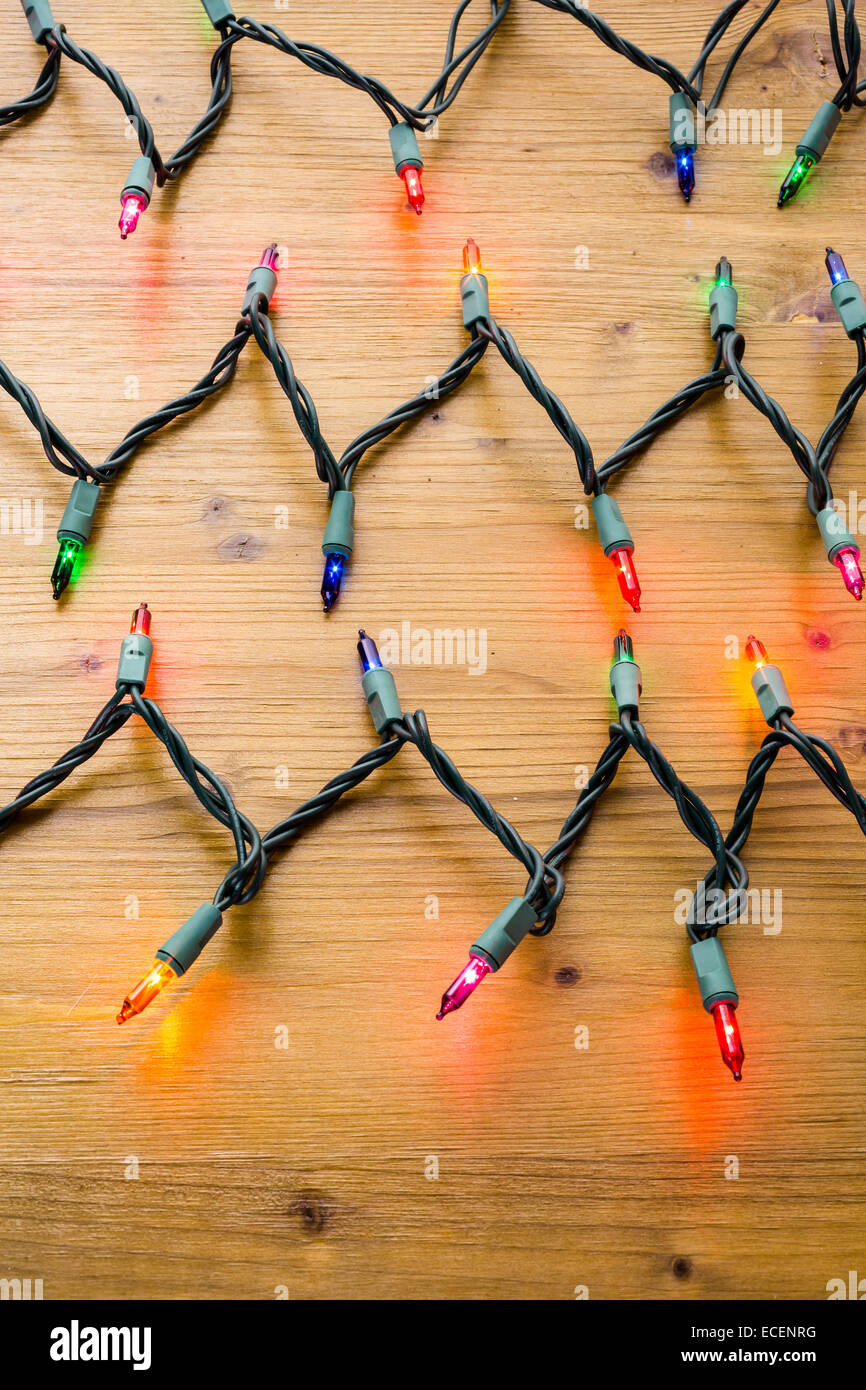 String of multicolor Christmas lights with green wiring Stock Photo - Alamy