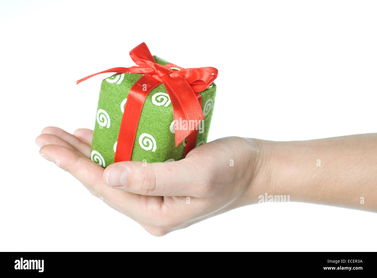 Hand holding gift isolated on white Stock Photo - Alamy