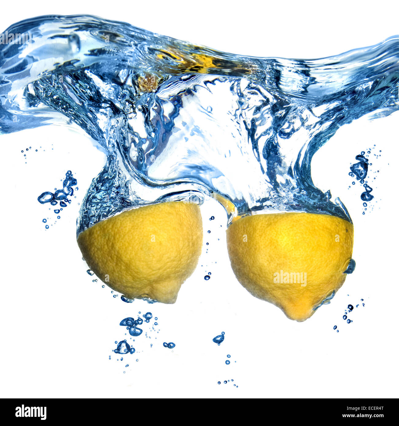 Fresh lemon dropped into water with bubbles isolated on white Stock Photo - Alamy