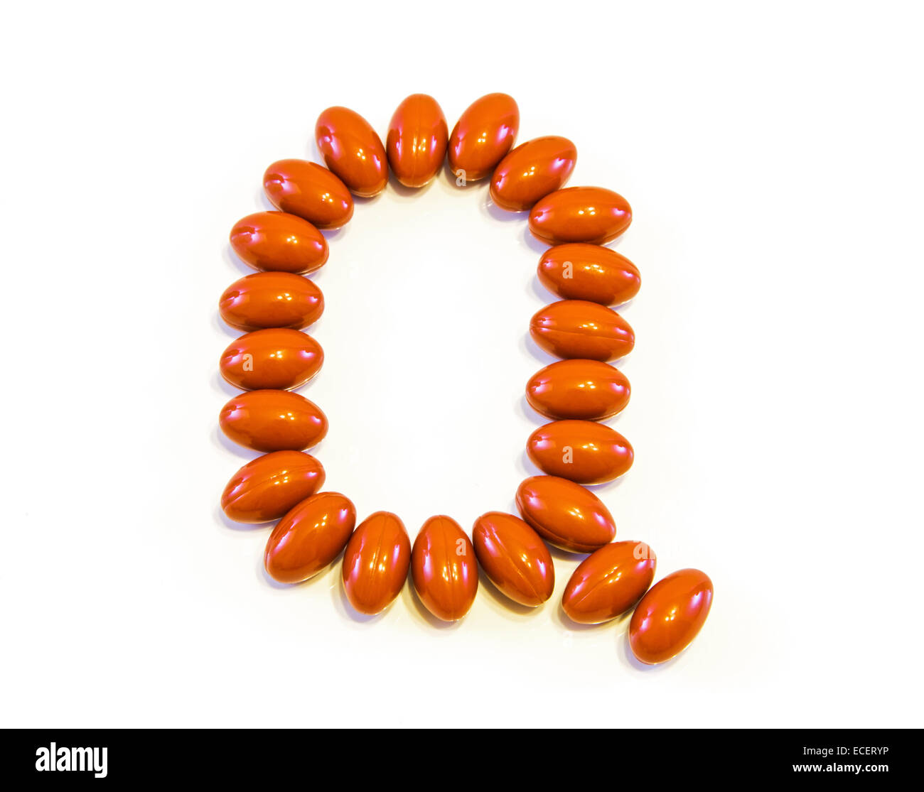 coenzyme q10 supplement capsules closeup on a white background Stock ...