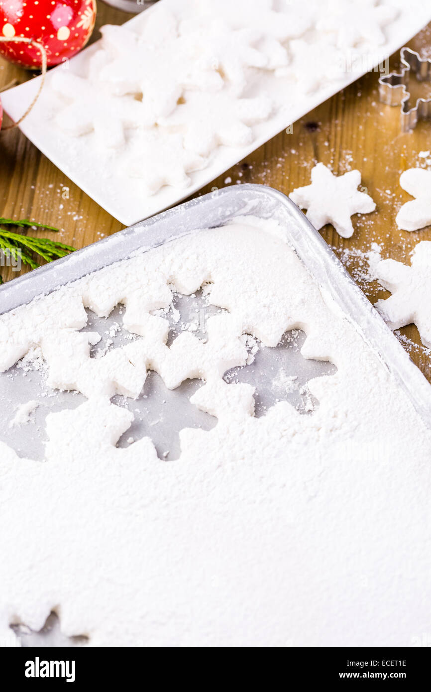 Making marshmallows in shapes of snowflakes for garnish hot chocolate ...