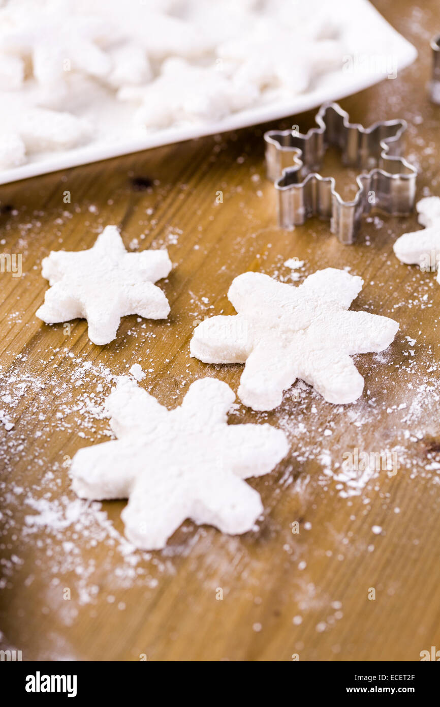 Making marshmallows in shapes of snowflakes for garnish hot chocolate ...
