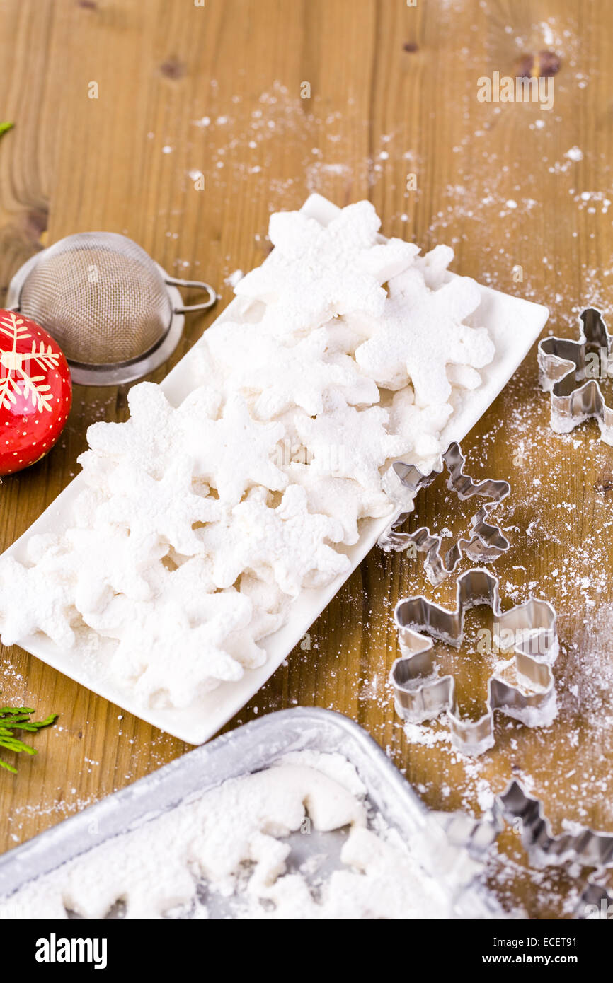 Making marshmallows in shapes of snowflakes for garnish hot chocolate ...